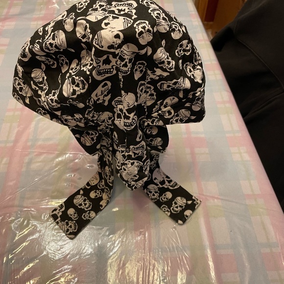 not sure | Other | This Is A Black And White Headband With Skulls From ...